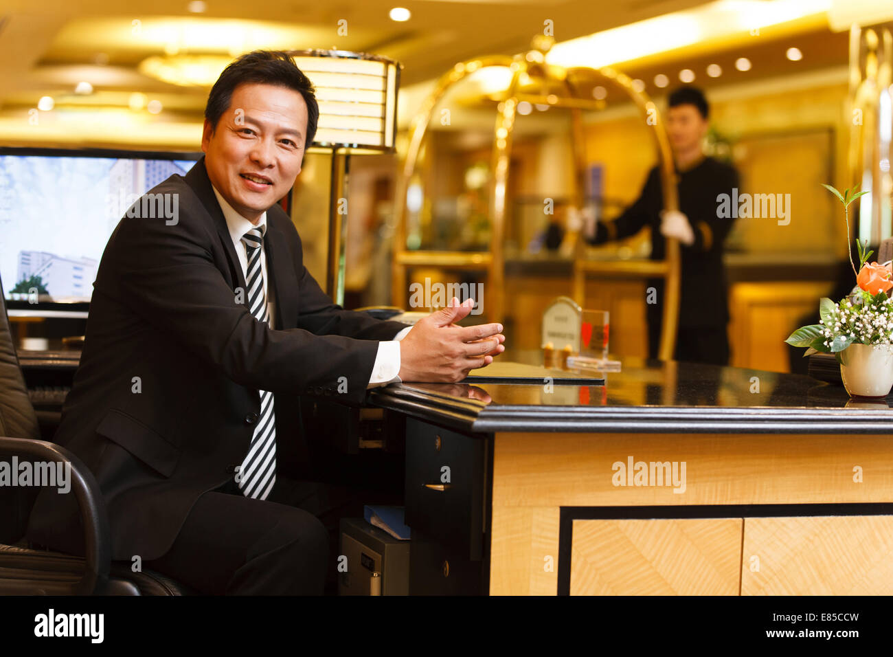 Asian hotel manager 40s hi-res stock photography and images - Alamy