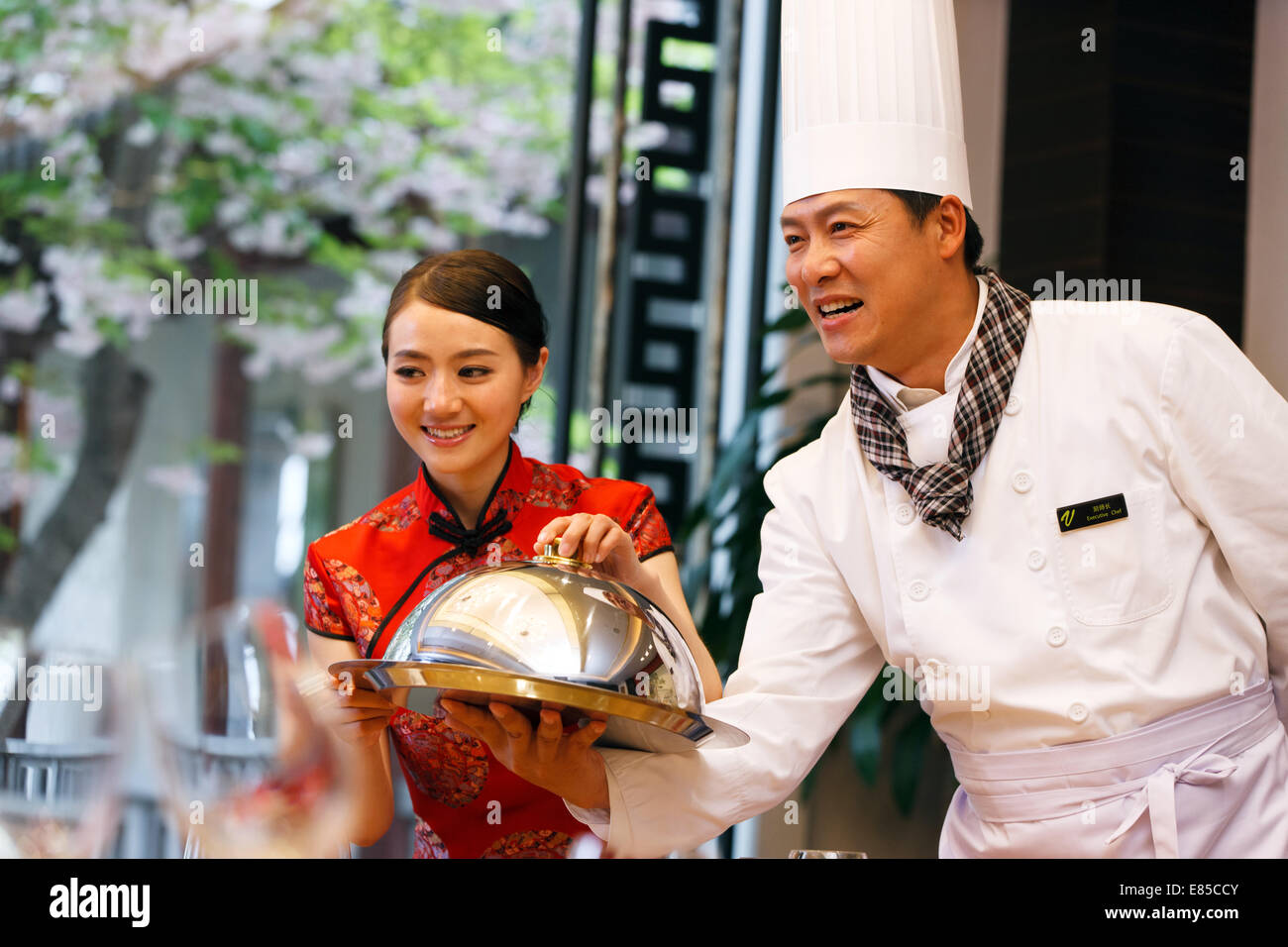 Chef with customer Stock Photo - Alamy
