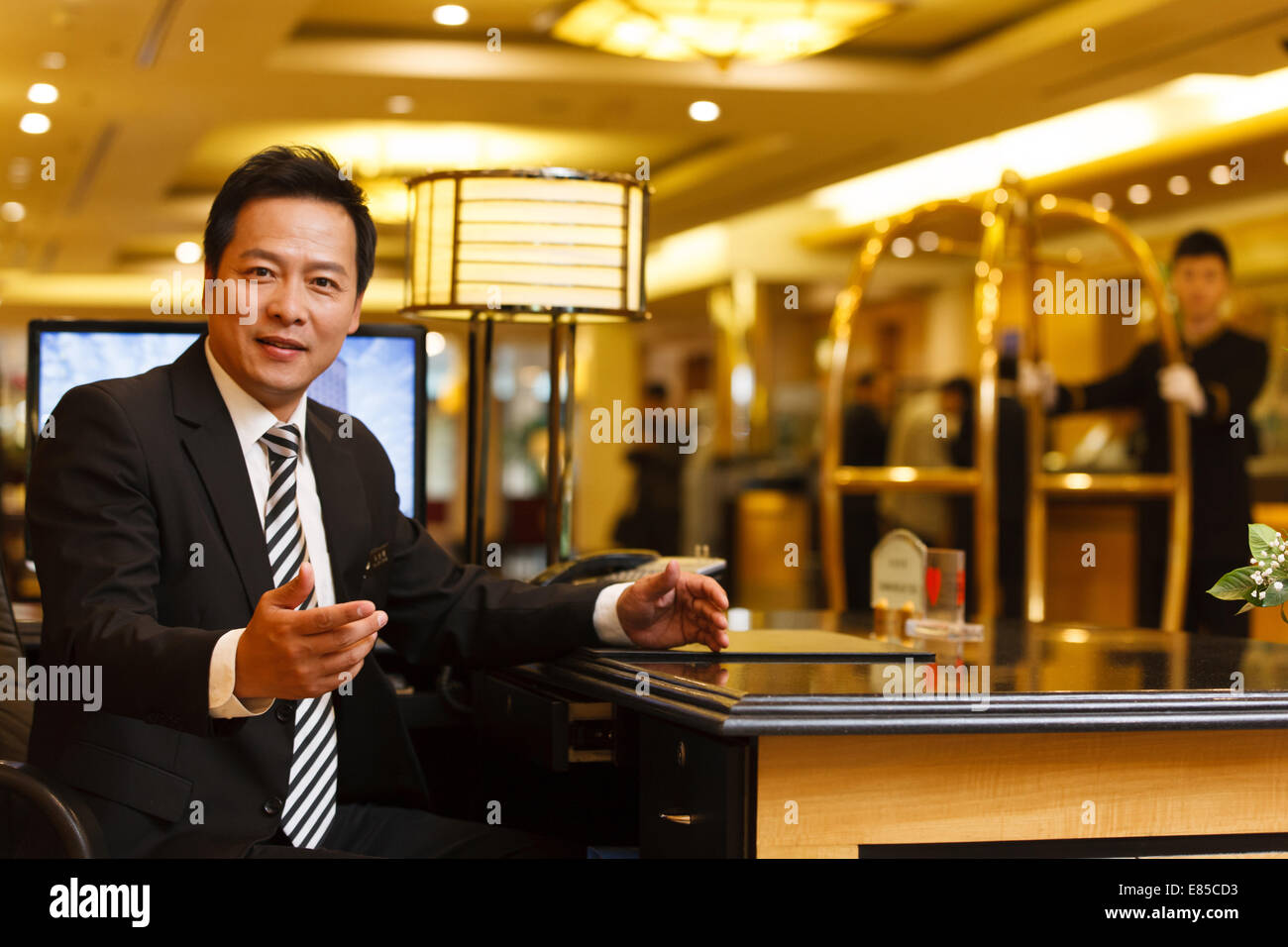 Asian hotel manager 40s hi-res stock photography and images - Alamy