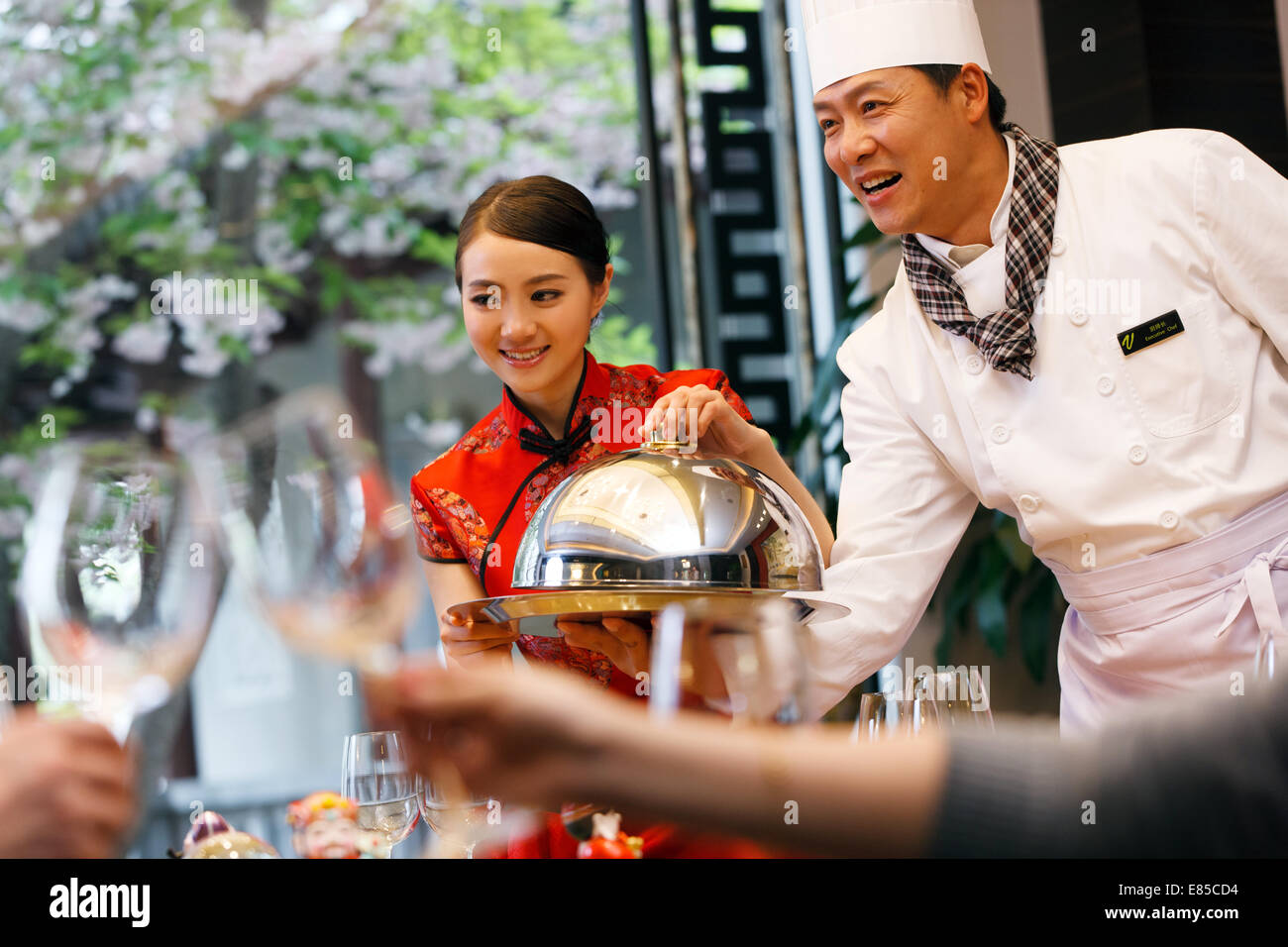 Chef with customer Stock Photo - Alamy