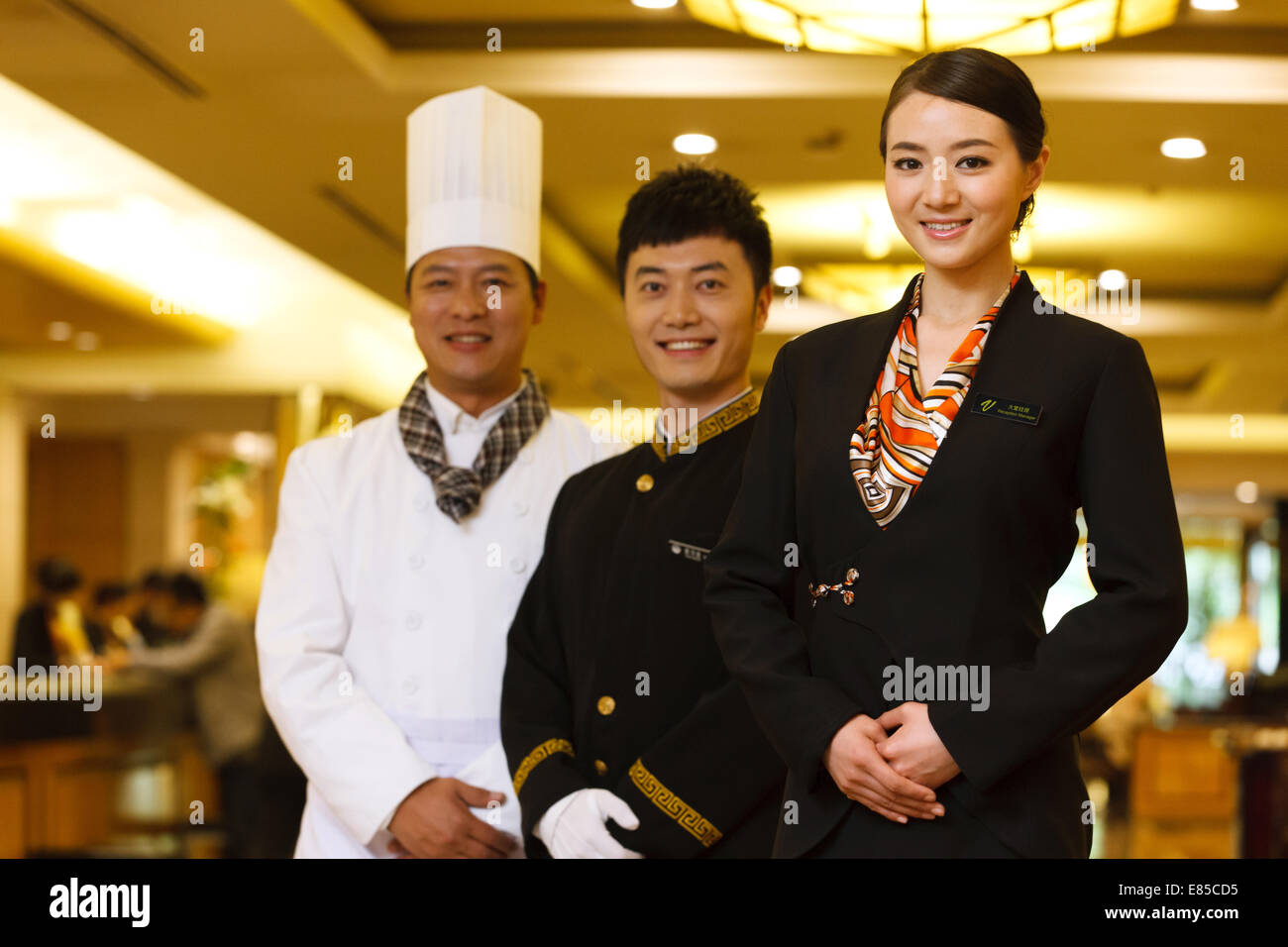 Portrait of hotel service staff Stock Photo - Alamy