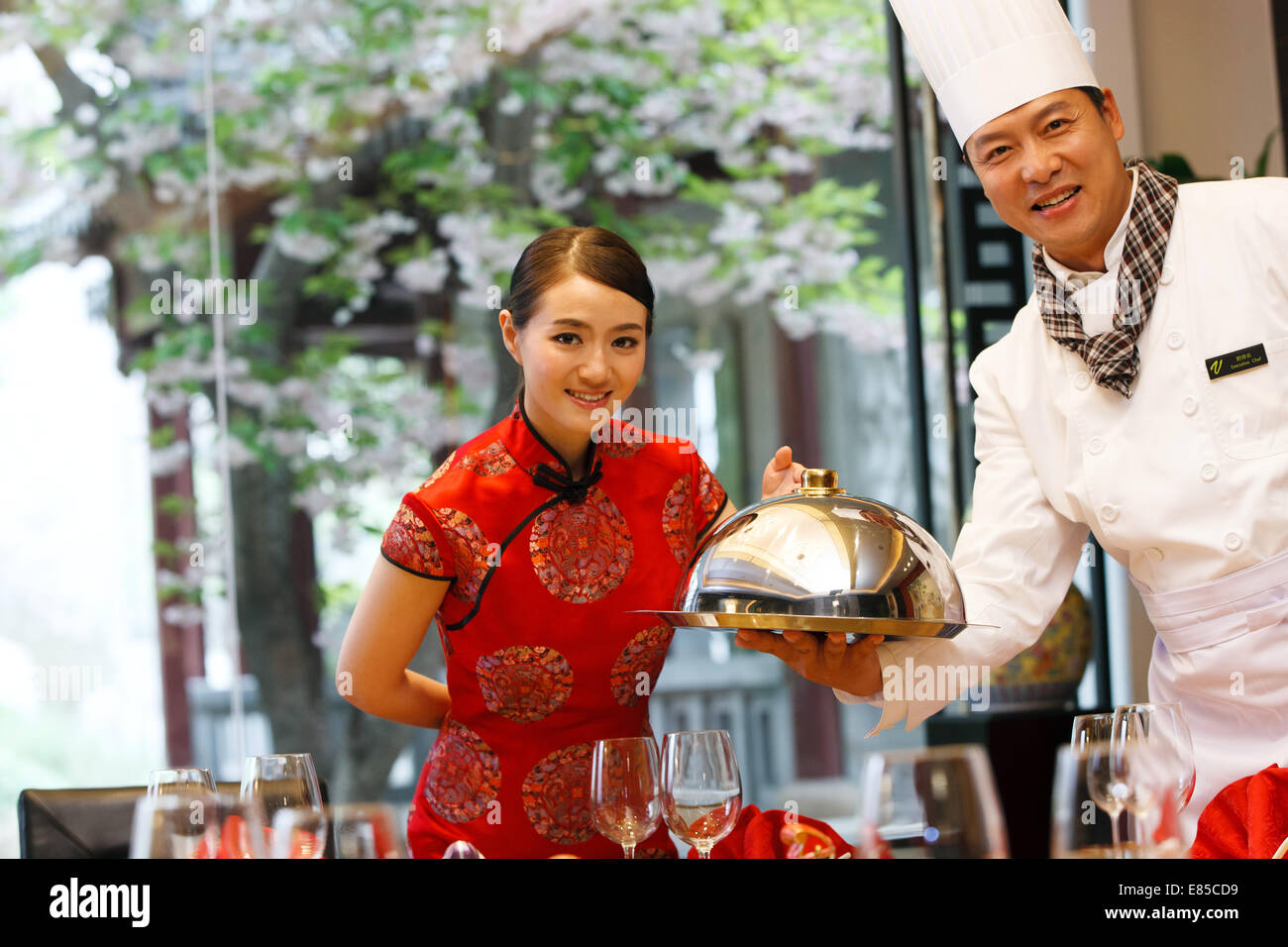 Chef with customer Stock Photo - Alamy