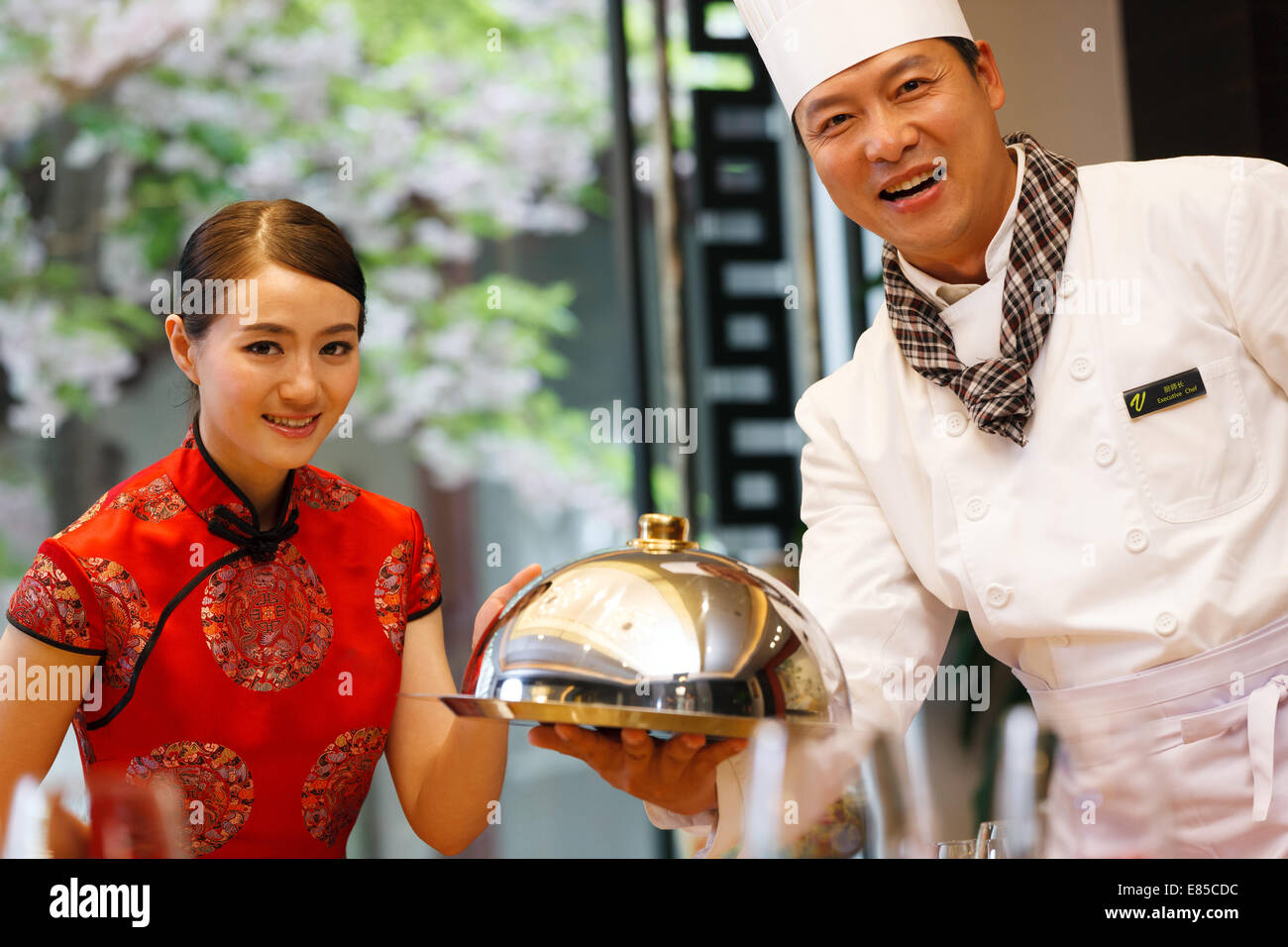 Chef with customer Stock Photo - Alamy