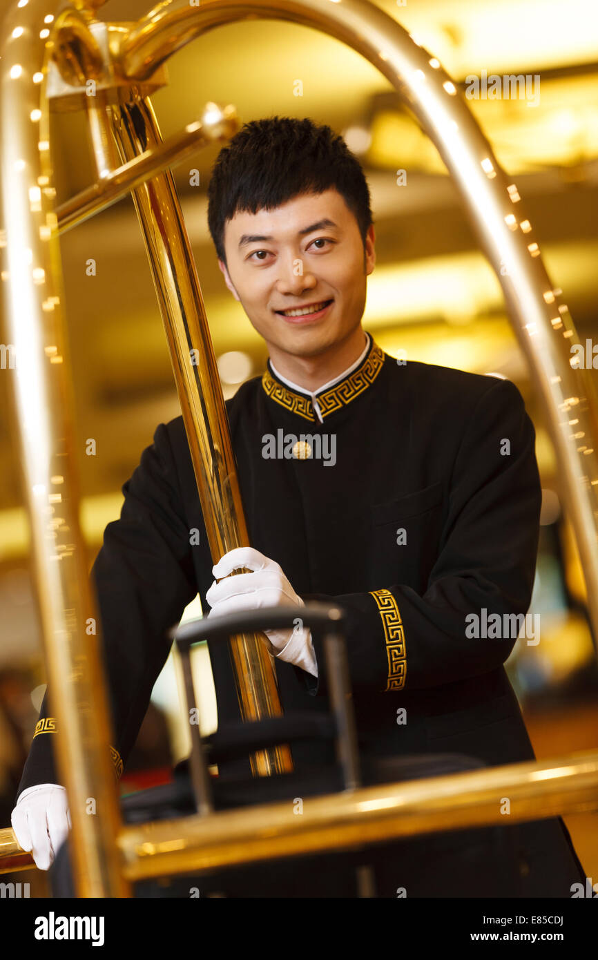 Portrait of hotel service staff Stock Photo - Alamy