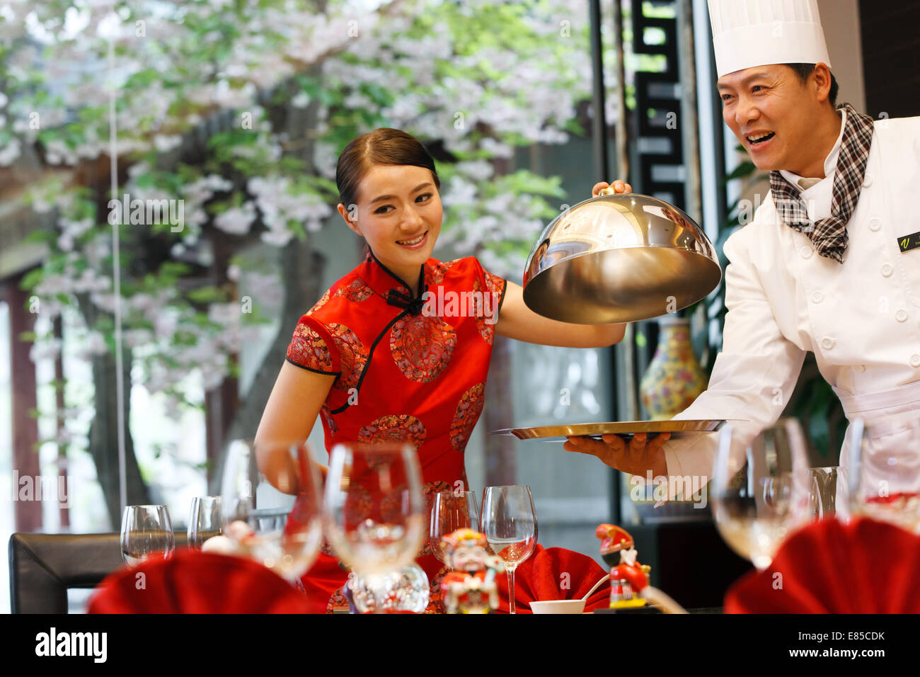 Chef with customer Stock Photo - Alamy