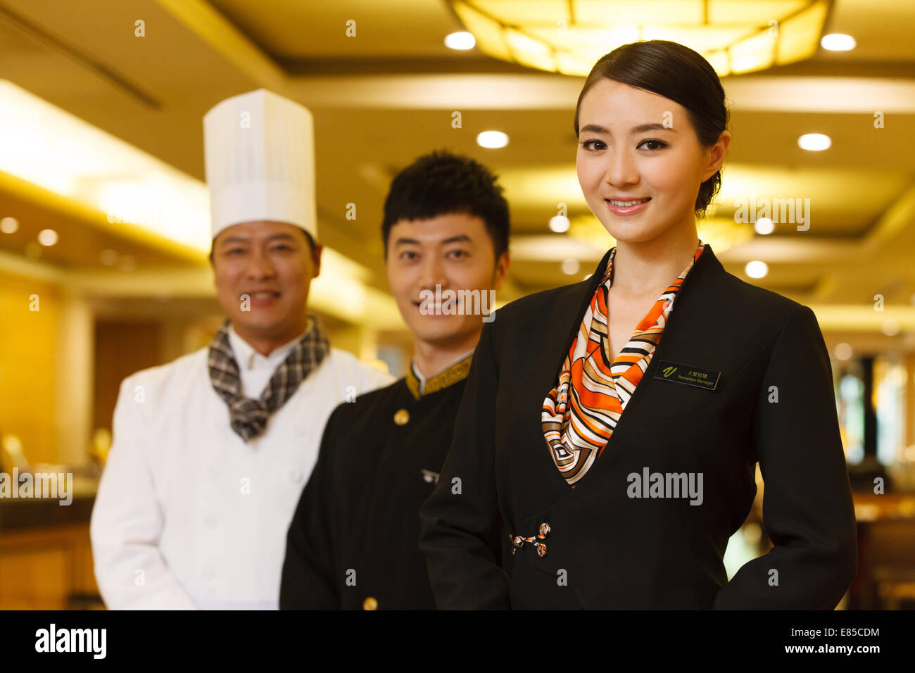 Portrait of hotel service staff Stock Photo - Alamy