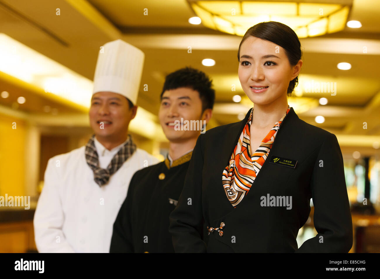 Portrait of hotel service staff Stock Photo - Alamy