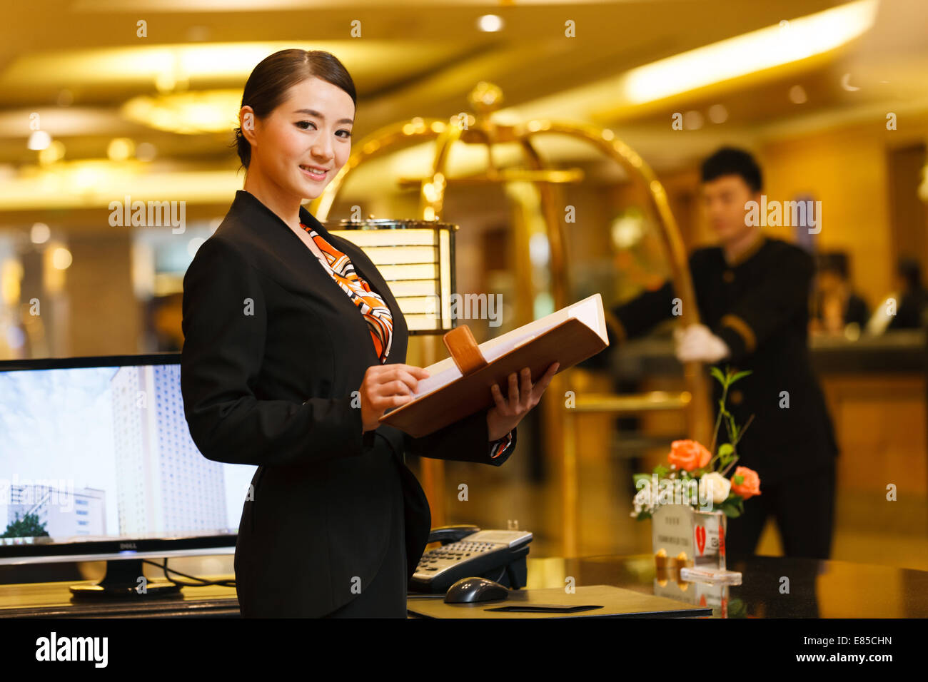 Portrait of hotel service staff Stock Photo - Alamy