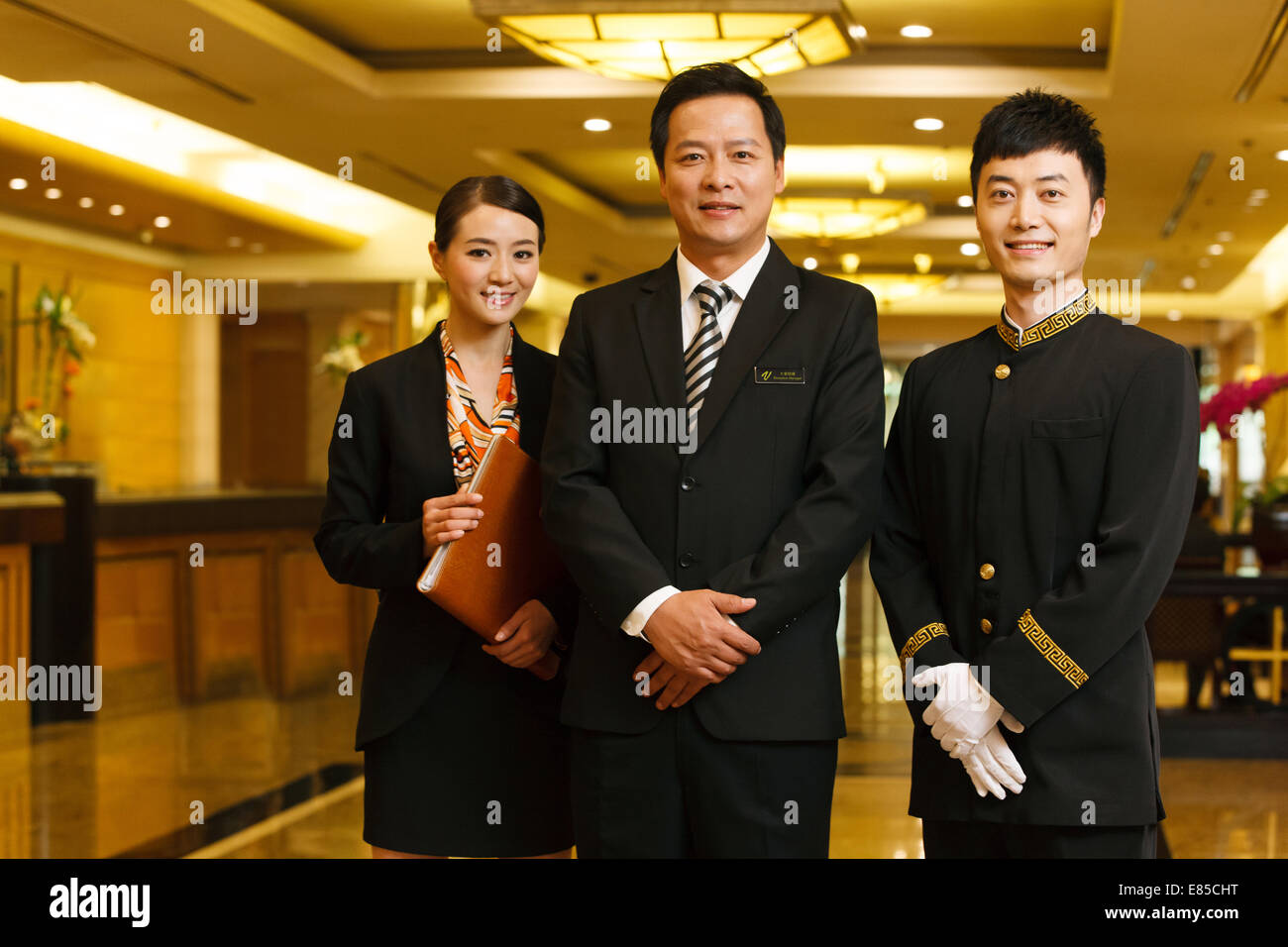 Portrait of hotel service staff Stock Photo - Alamy