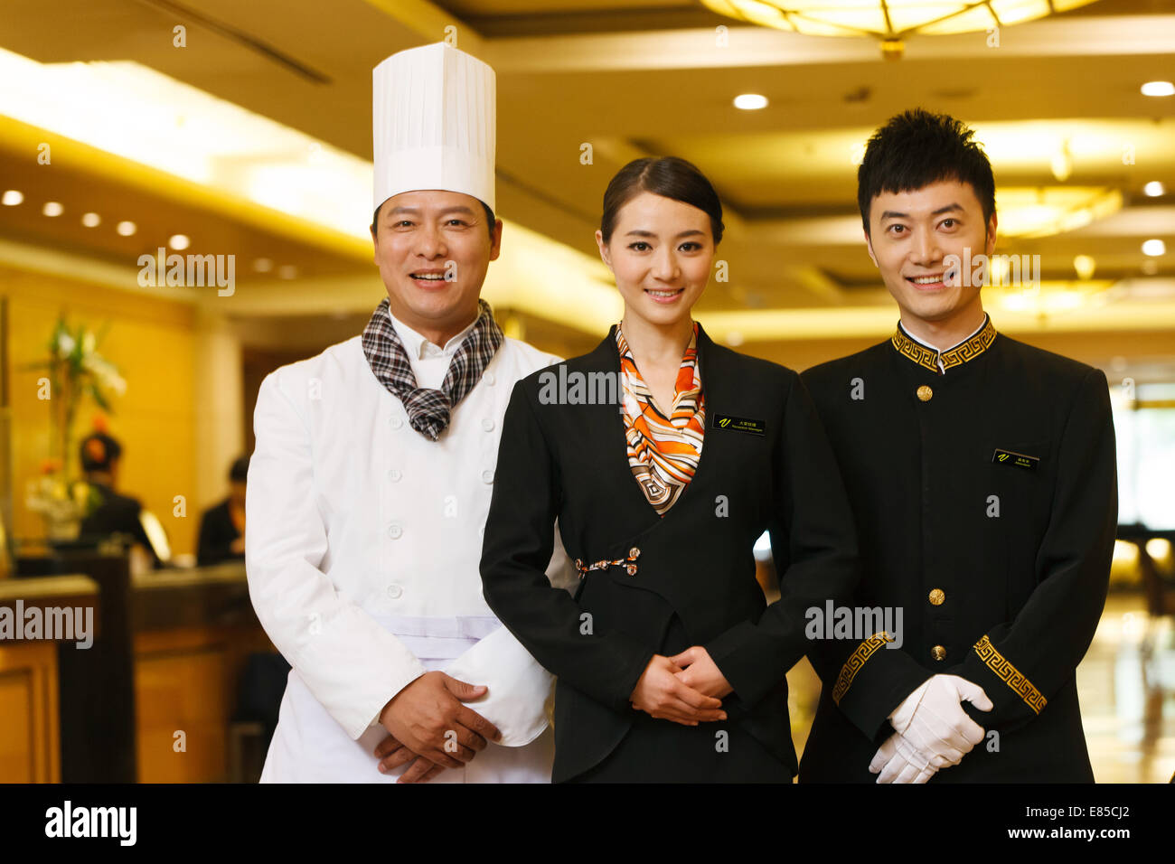 Portrait of hotel service staff Stock Photo - Alamy