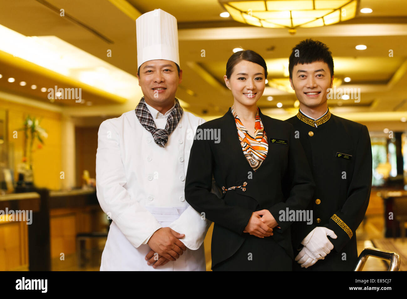 Portrait of hotel service staff Stock Photo - Alamy