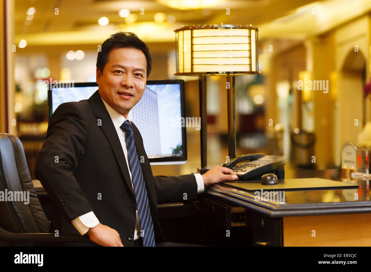 Portrait of hotel service staff Stock Photo - Alamy