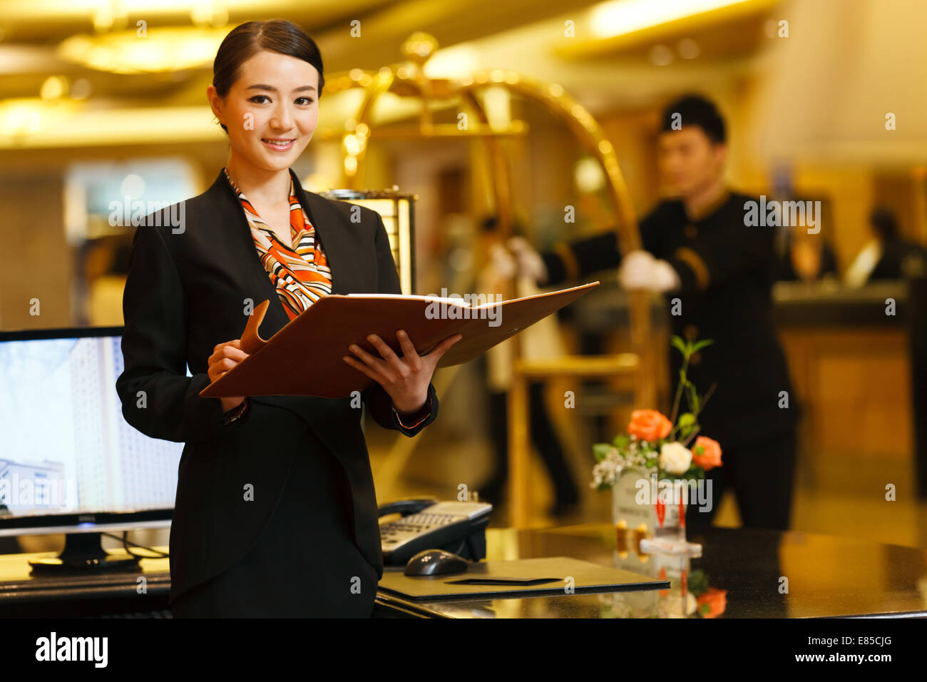 Portrait of hotel service staff Stock Photo - Alamy
