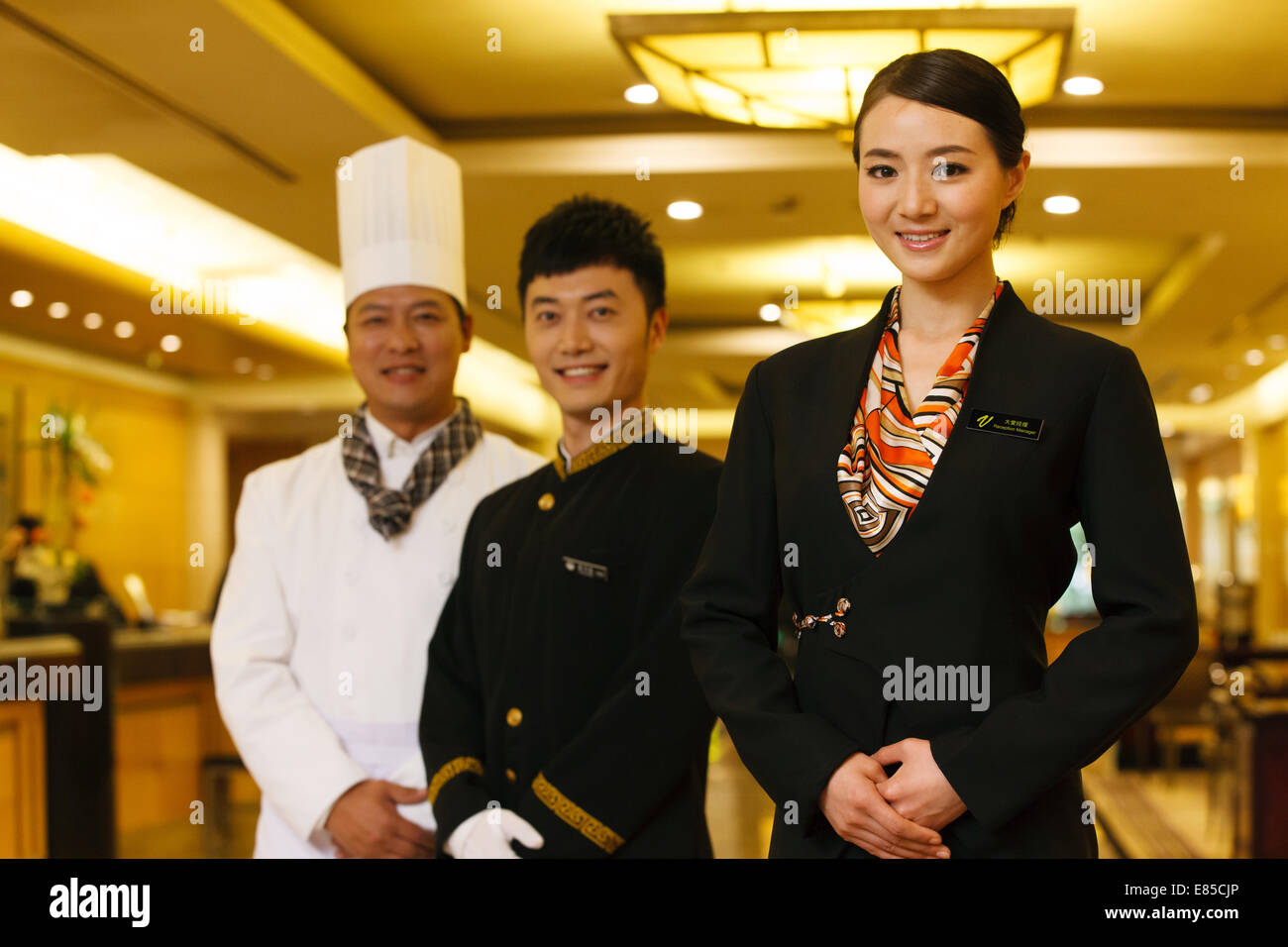 Portrait of hotel service staff Stock Photo - Alamy