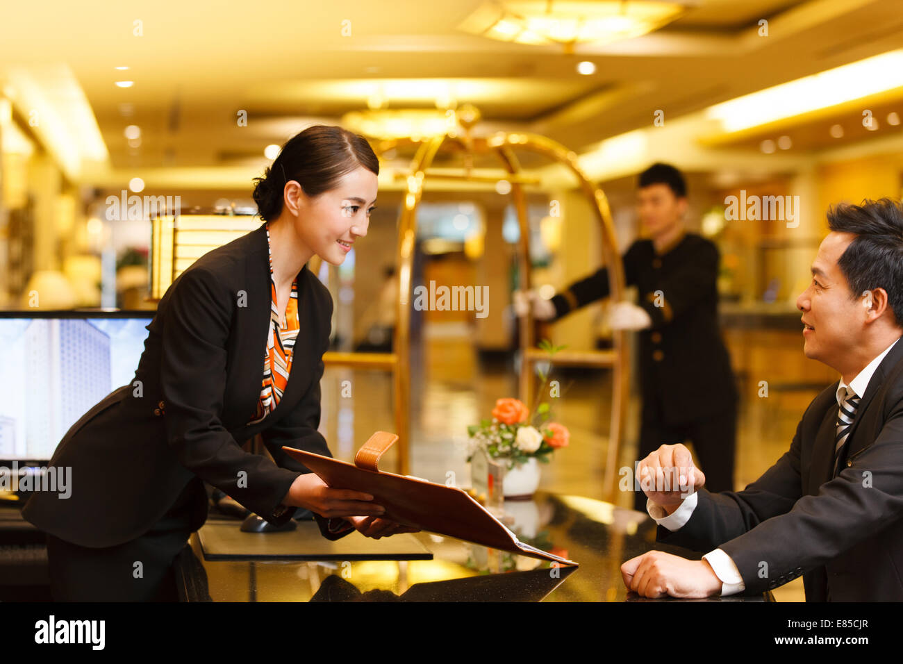 Businessman walking hotel room sitting hi-res stock photography and ...