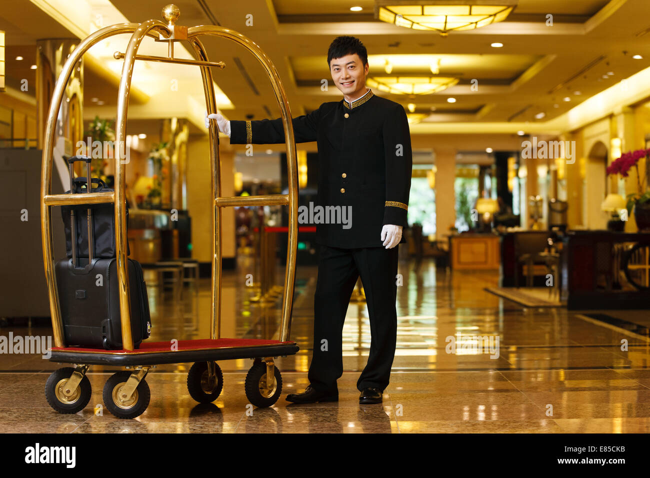 Portrait of hotel service staff Stock Photo - Alamy