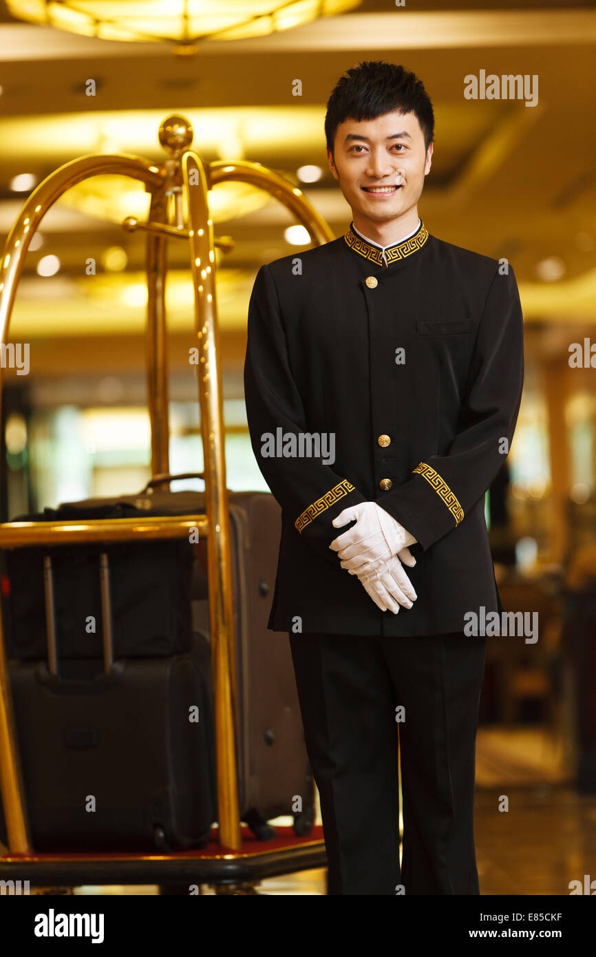 Portrait of hotel service staff Stock Photo - Alamy