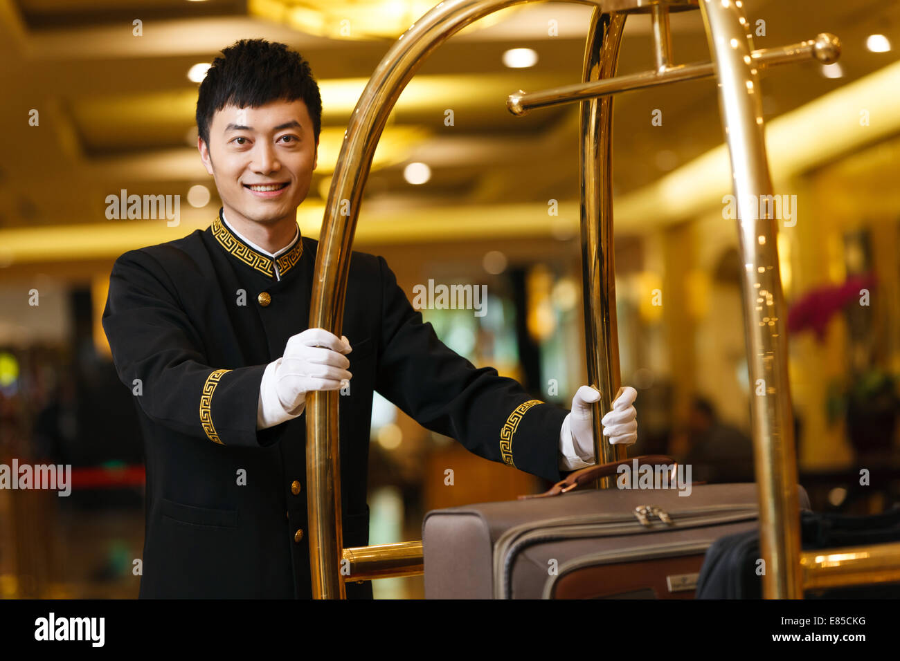 Portrait of hotel service staff Stock Photo - Alamy