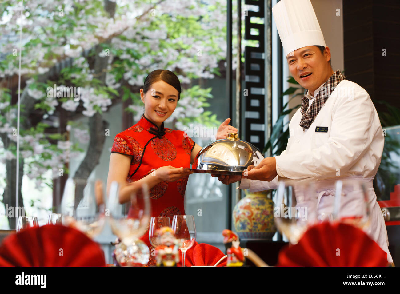 Chef with customer Stock Photo - Alamy