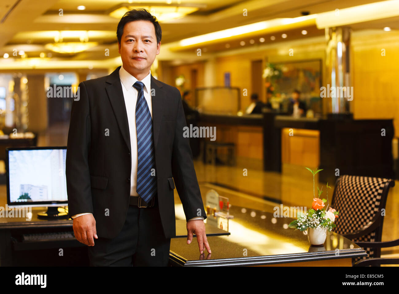 Portrait of hotel service staff Stock Photo - Alamy
