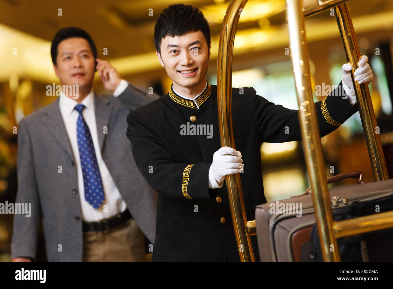 Portrait of hotel service staff Stock Photo - Alamy