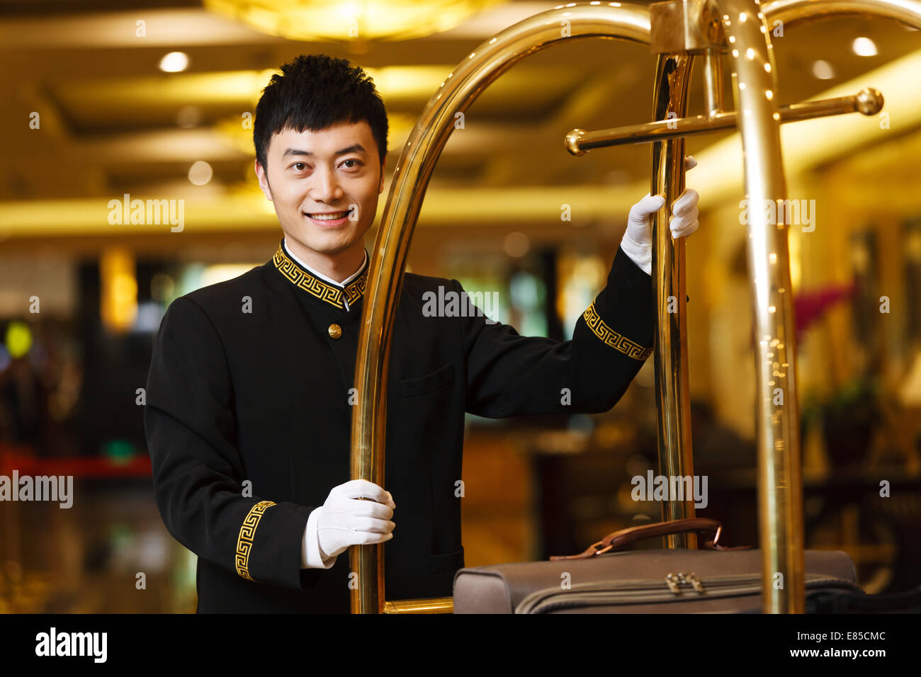 Portrait of hotel service staff Stock Photo - Alamy