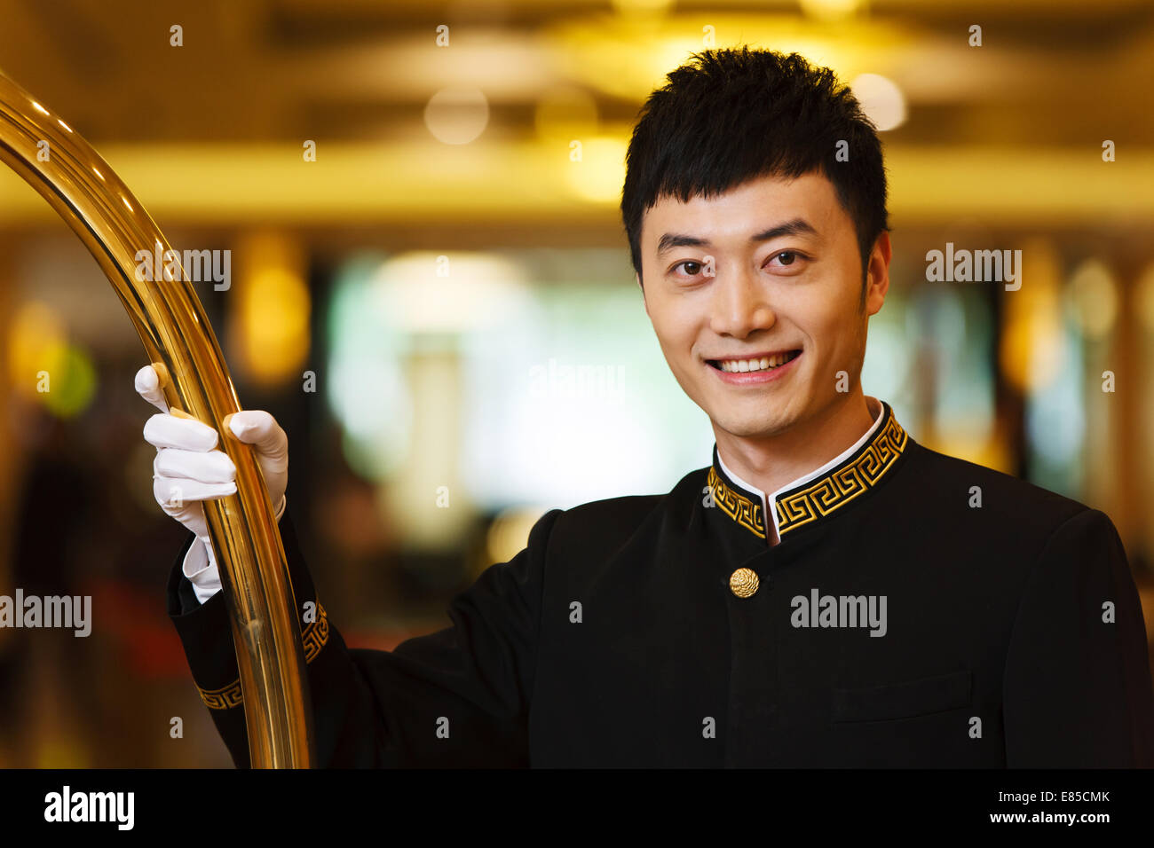 Portrait of hotel service staff Stock Photo - Alamy