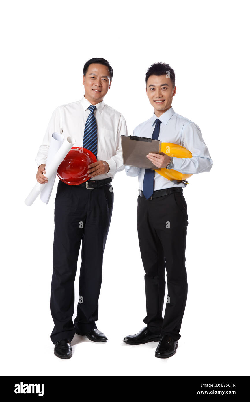 Two people engineer blueprint Cut Out Stock Images & Pictures - Alamy