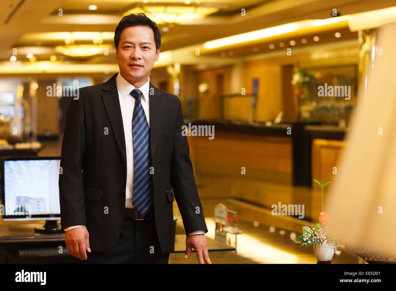 Portrait of hotel service staff Stock Photo - Alamy