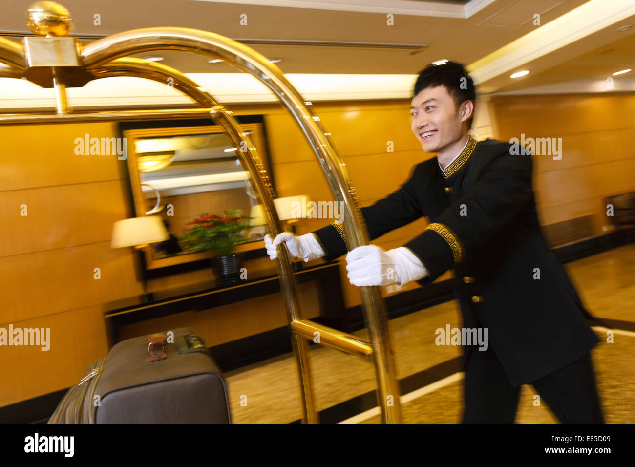 Portrait of hotel service staff Stock Photo - Alamy
