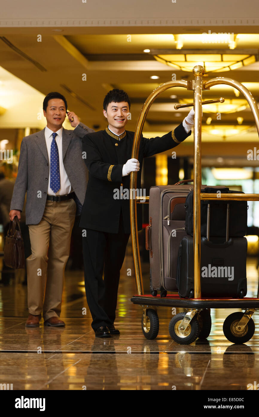 Portrait of hotel service staff Stock Photo - Alamy