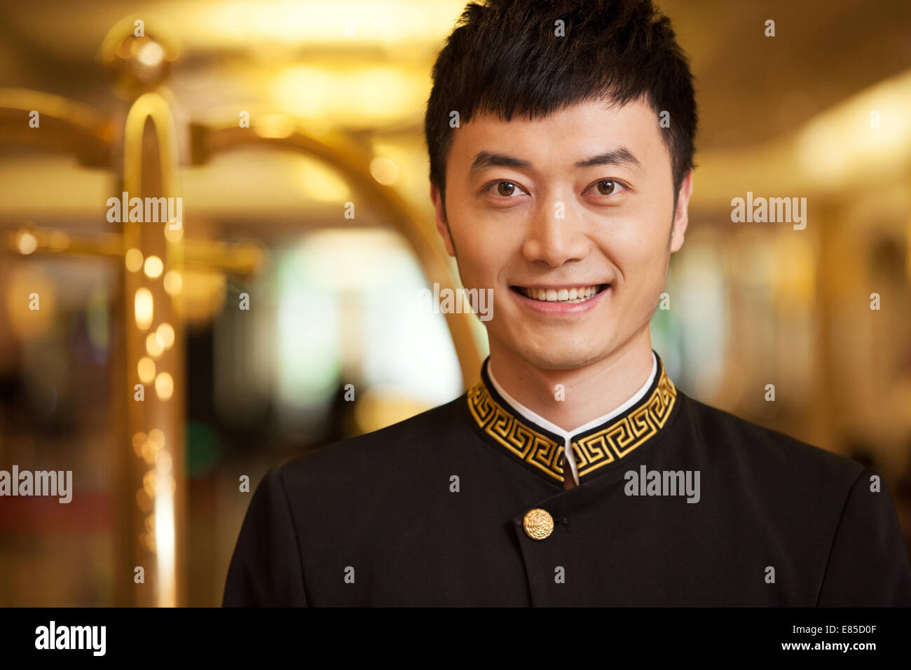 Portrait of hotel service staff Stock Photo - Alamy