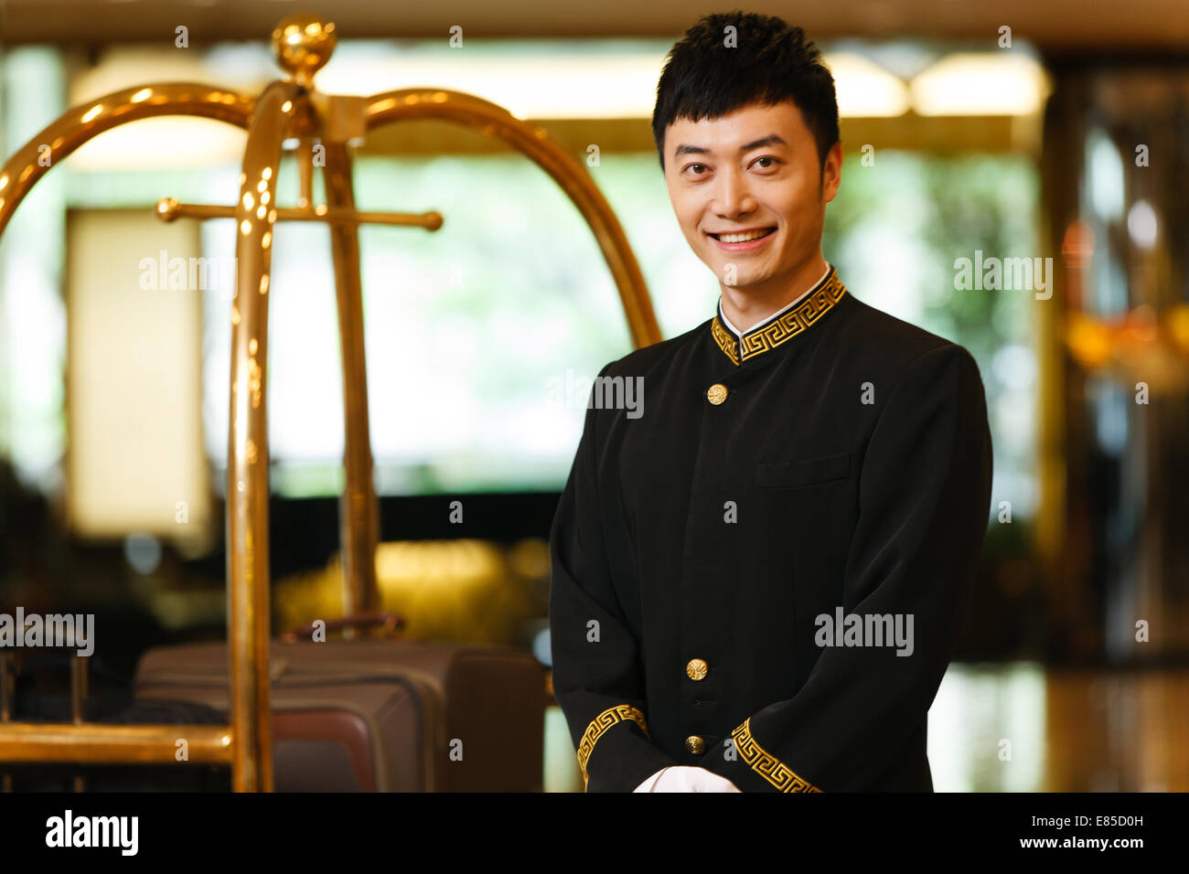 Portrait of hotel service staff Stock Photo - Alamy