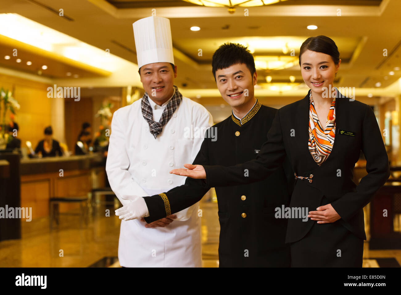Portrait of hotel service staff Stock Photo - Alamy