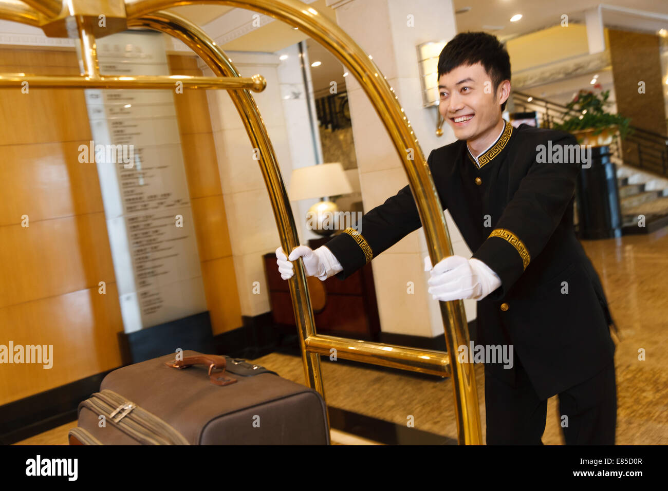 Portrait of hotel service staff Stock Photo - Alamy