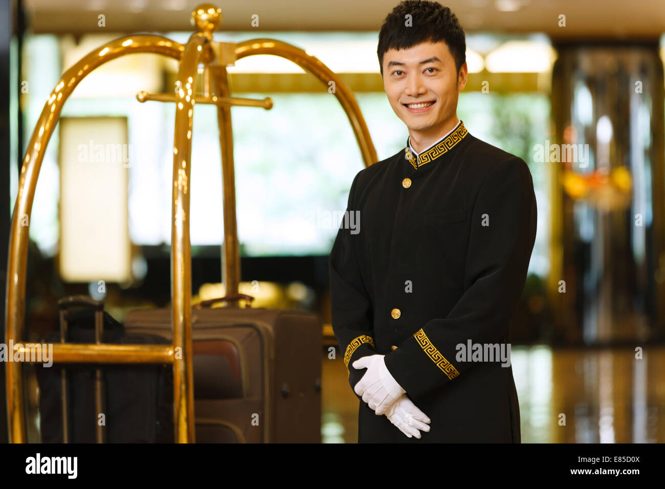 Portrait of hotel service staff Stock Photo - Alamy