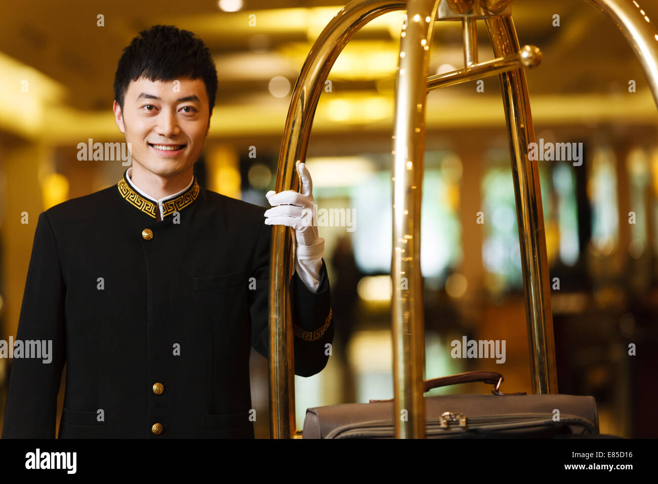 Portrait of hotel service staff Stock Photo - Alamy