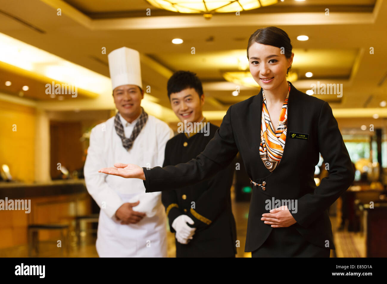 Portrait of hotel service staff Stock Photo - Alamy