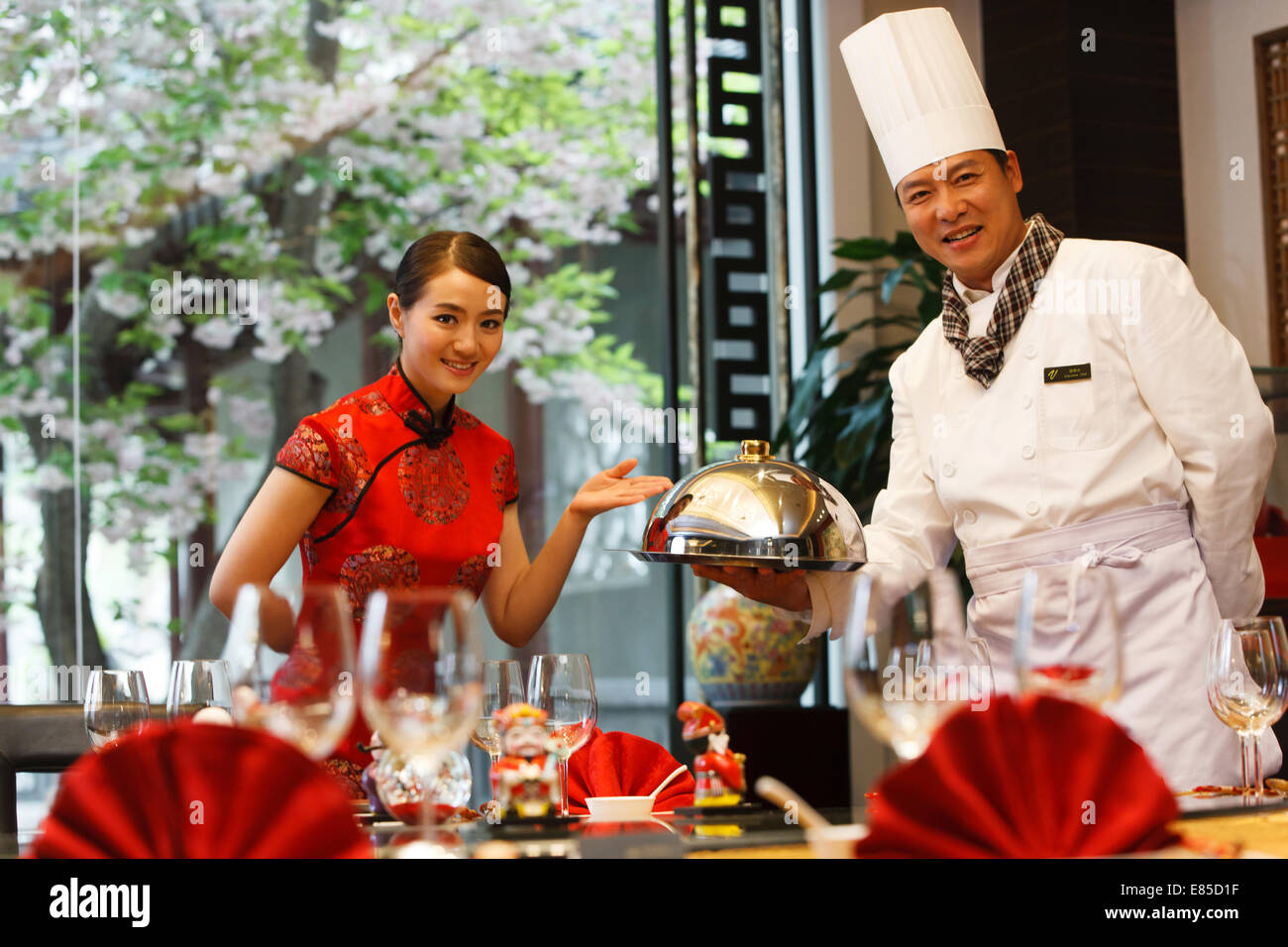 Chef with customer Stock Photo - Alamy
