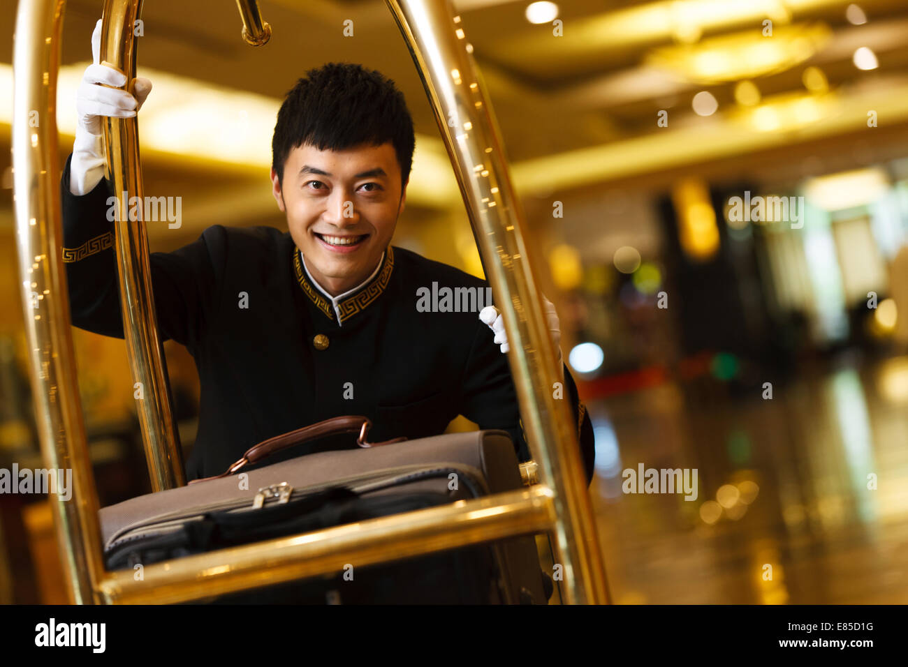 Portrait of hotel service staff Stock Photo - Alamy