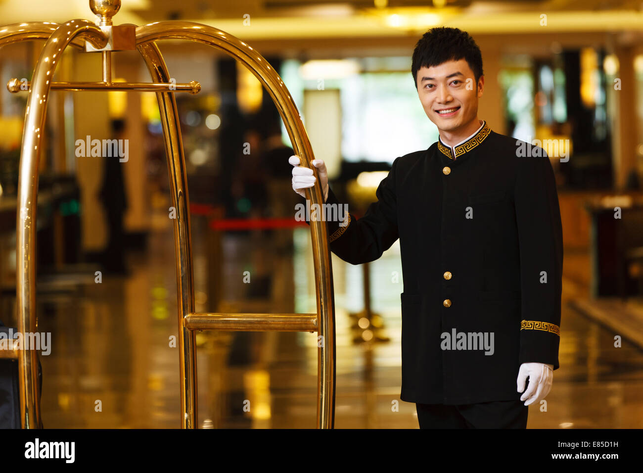 Portrait of hotel service staff Stock Photo - Alamy
