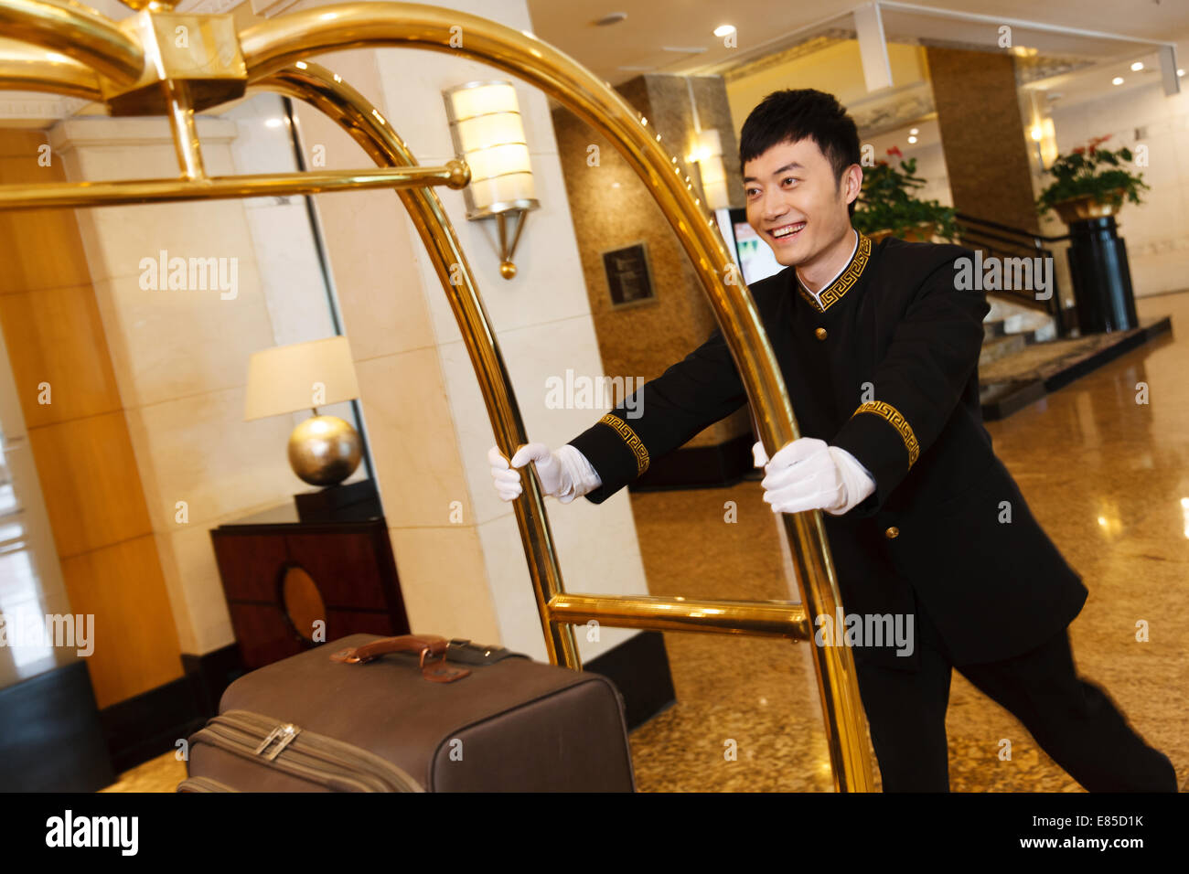 Portrait of hotel service staff Stock Photo - Alamy