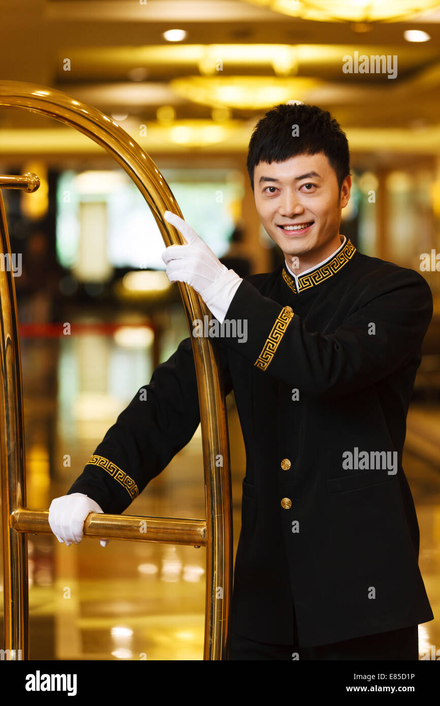 Portrait of hotel service staff Stock Photo - Alamy