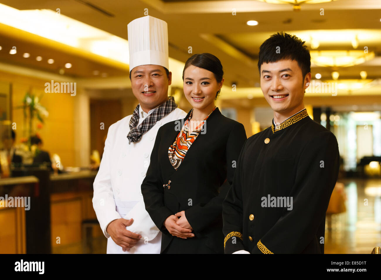 Portrait of hotel service staff Stock Photo - Alamy