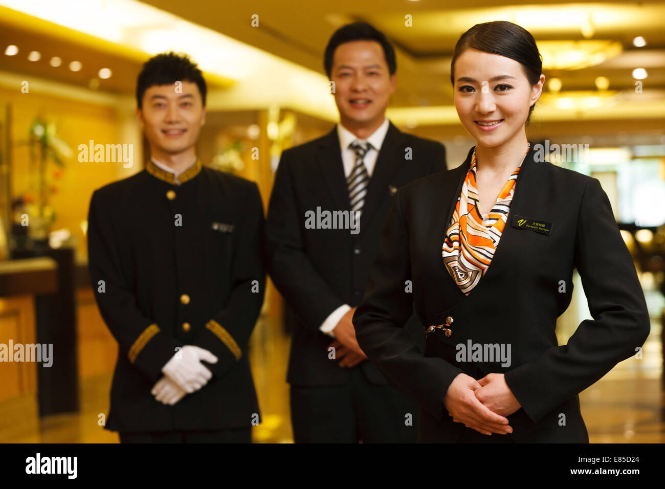Portrait of hotel service staff Stock Photo - Alamy