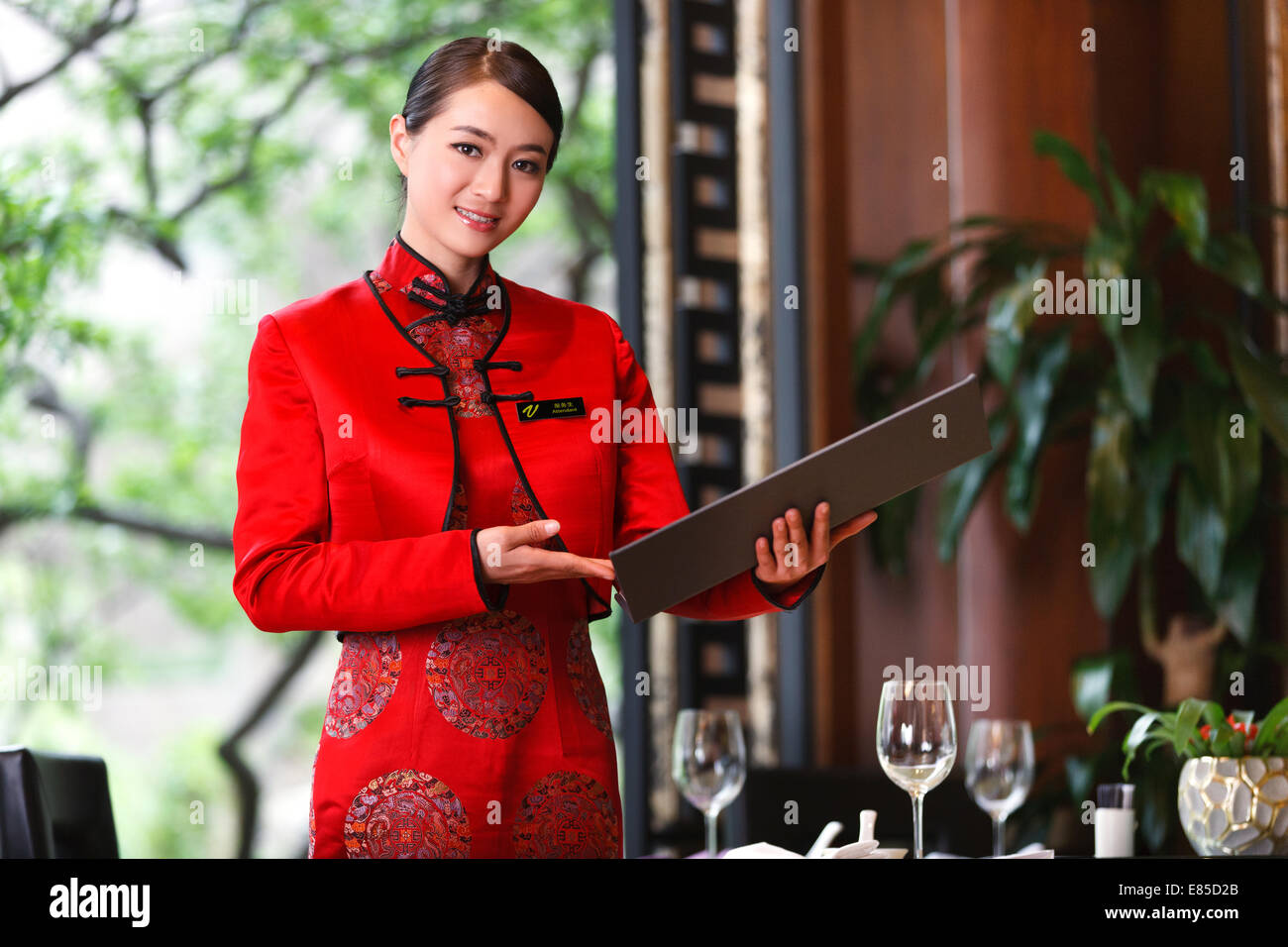 Portrait of hotel service staff Stock Photo - Alamy