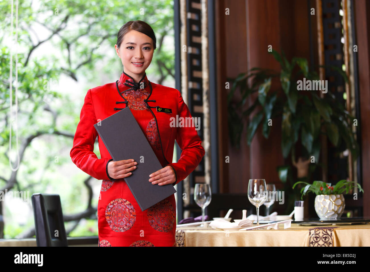 Portrait of hotel service staff Stock Photo - Alamy