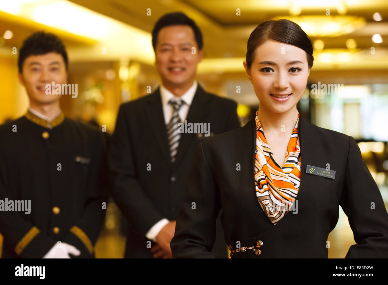 Portrait of hotel service staff Stock Photo - Alamy