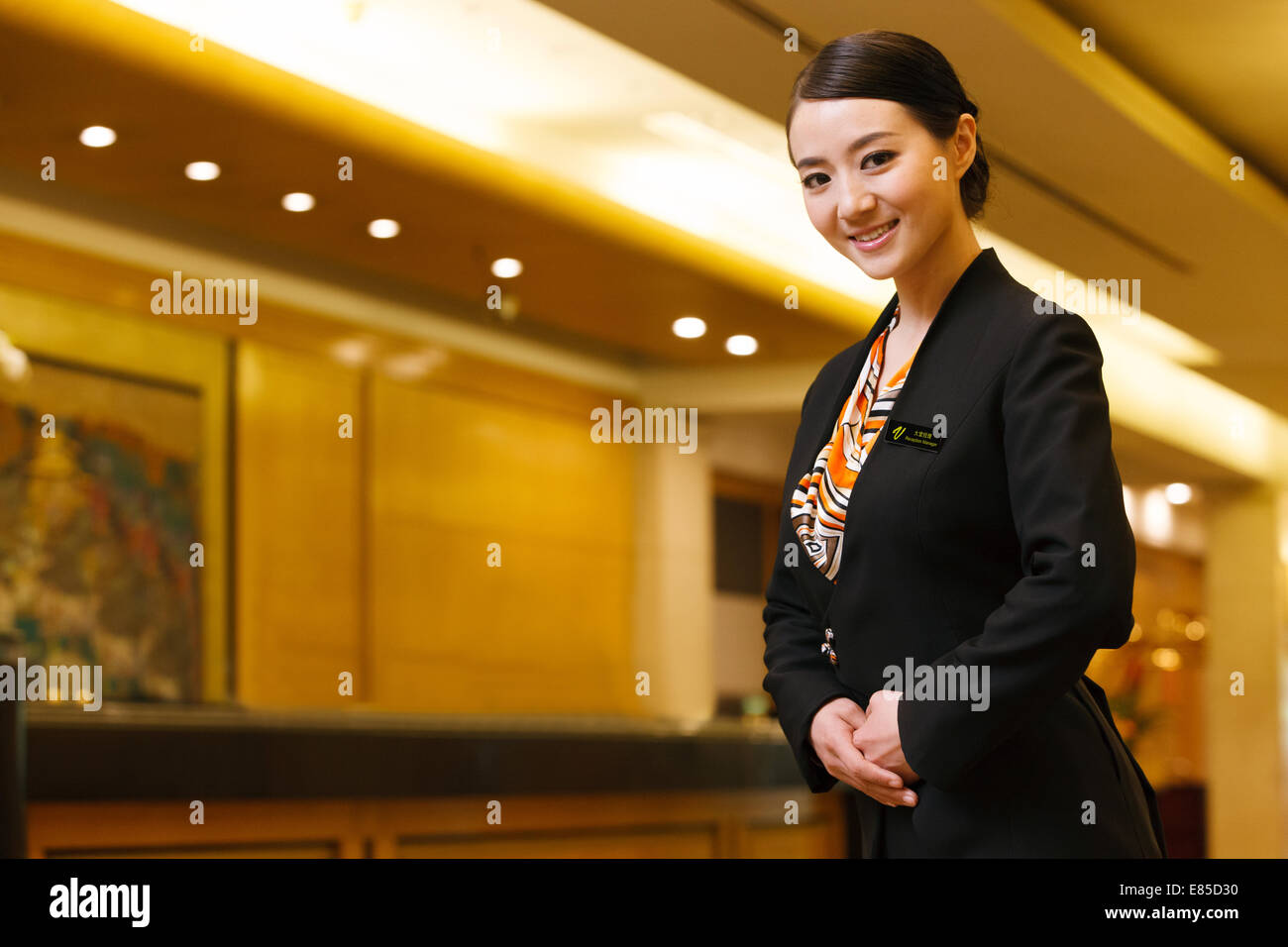 Portrait of hotel service staff Stock Photo - Alamy