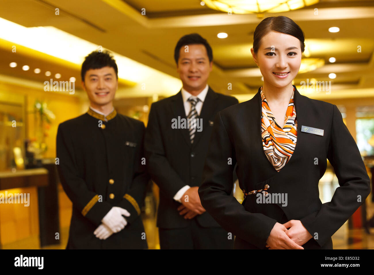 Portrait of hotel service staff Stock Photo - Alamy
